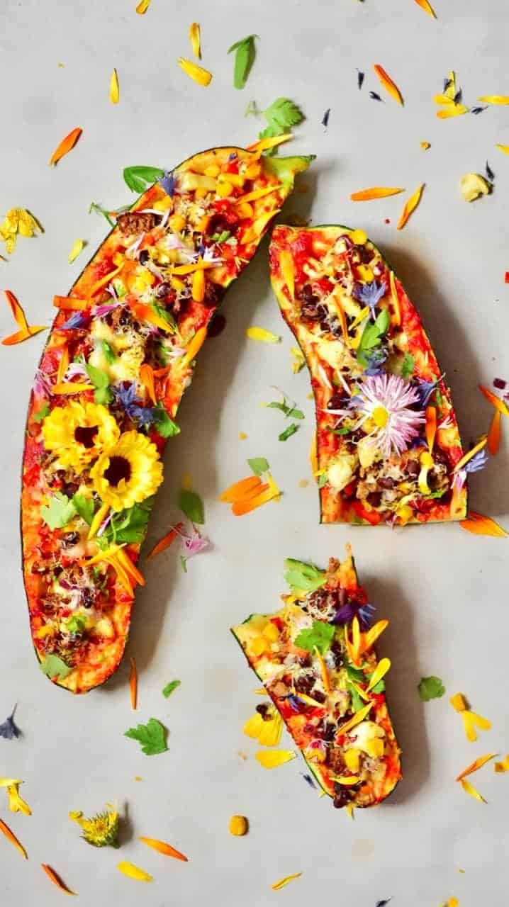 Healthy Rainbow Zucchini Boats w/ bean, corn, onion & veggie mince filling