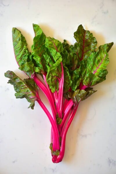 Vegan Stuffed Swiss Chard Rolls ( with herby tomato rice) - Alphafoodie