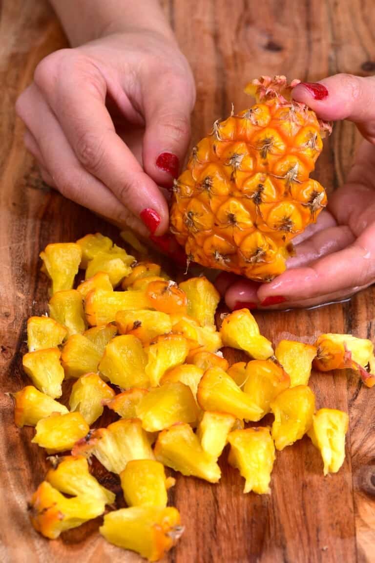 How To Cut A Pineapple (+ Peeling Pineapple Hack) - Alphafoodie