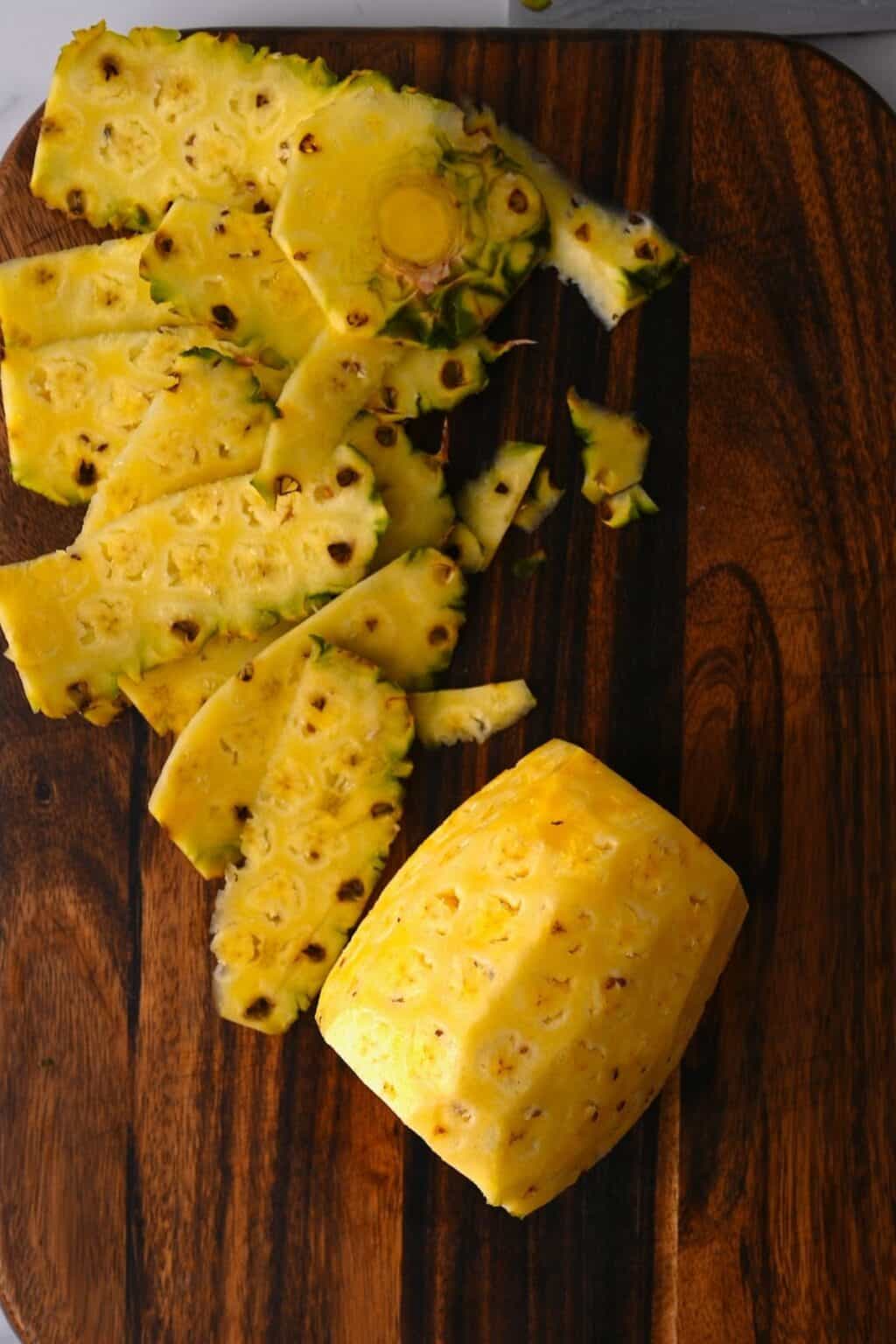 How To Cut A Pineapple (+ Peeling Pineapple Hack) - Alphafoodie