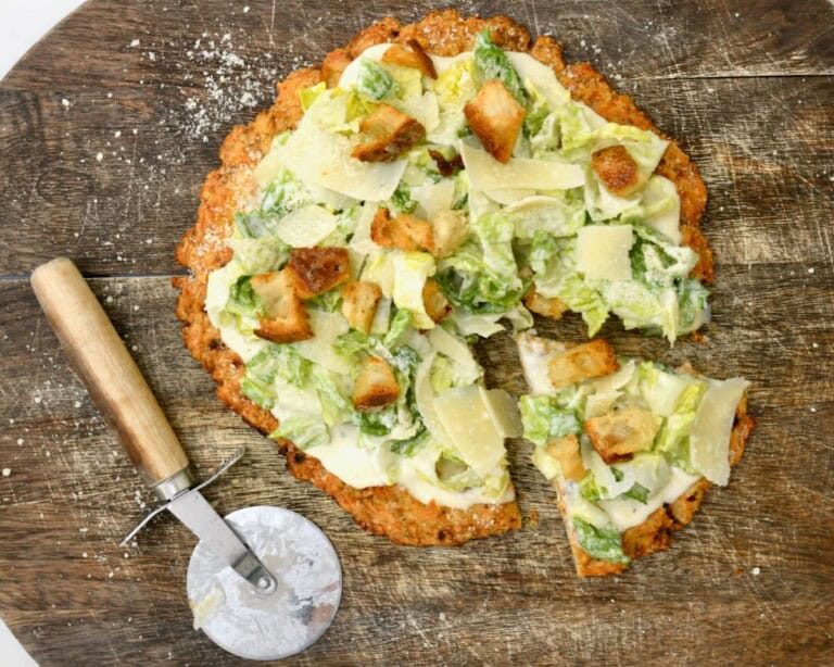Chicken Crust Pizza Topped with Caesar Salad - Alphafoodie