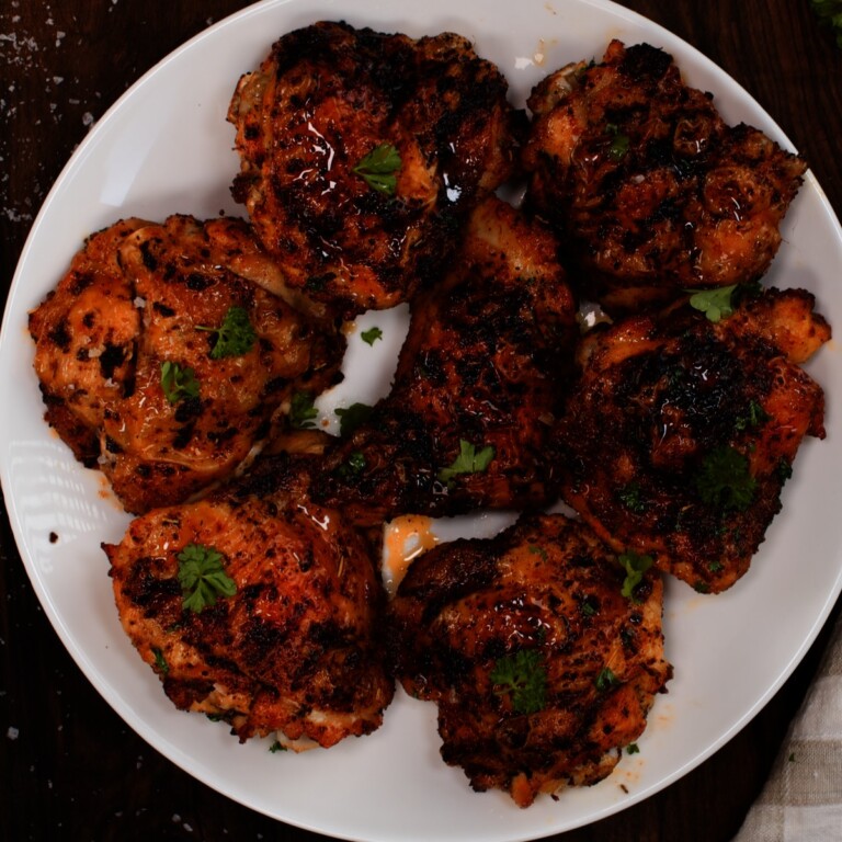 Crispy baked chicken thighs (easy and juicy oven method) - Alphafoodie